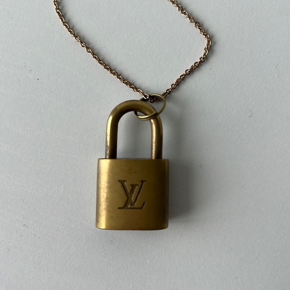 Louis Vuitton | Jewelry | Louis Vuitton Small Lock | Poshmark